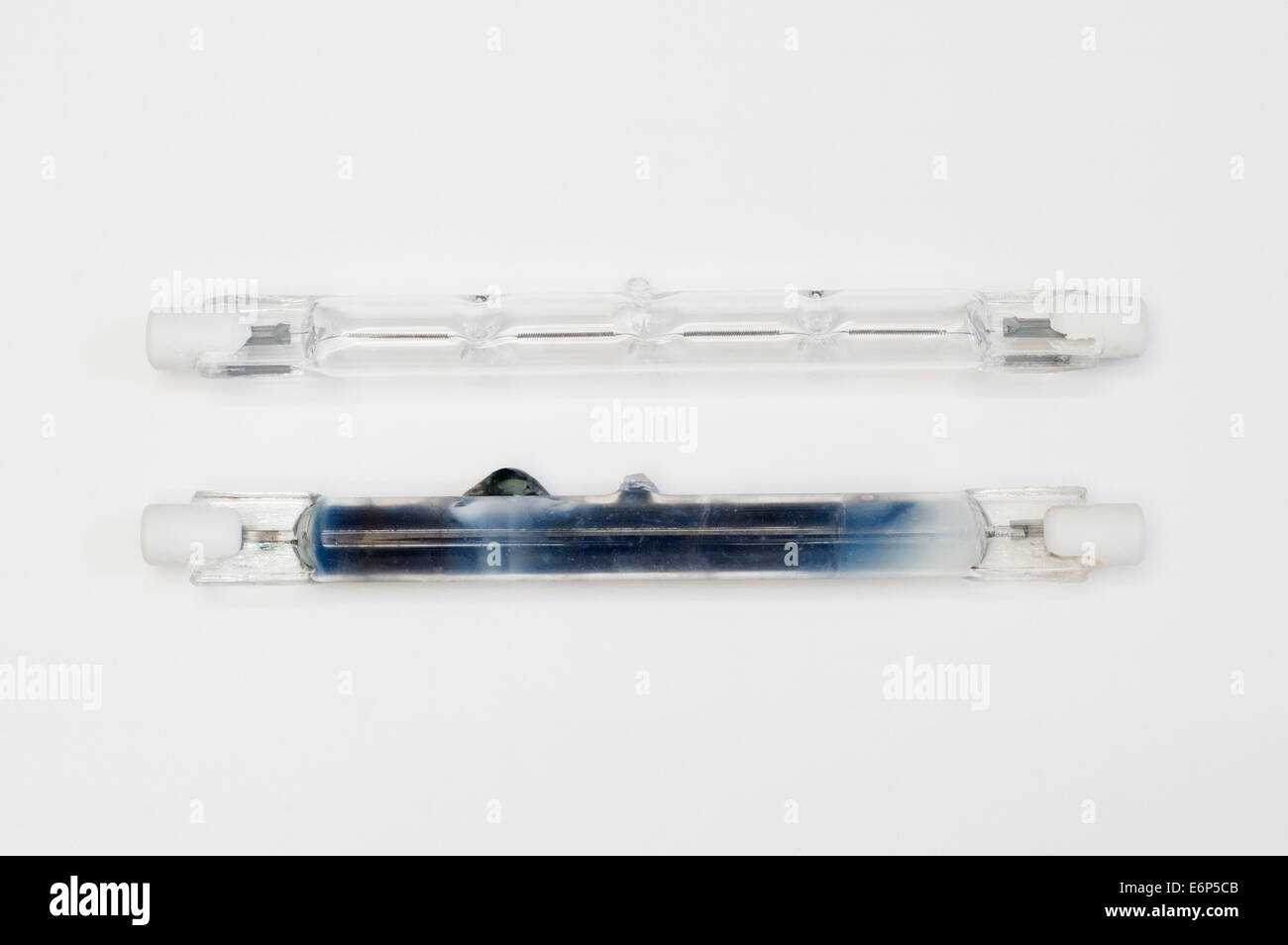 New and burnt halogen bulbs Stock Photo - Alamy