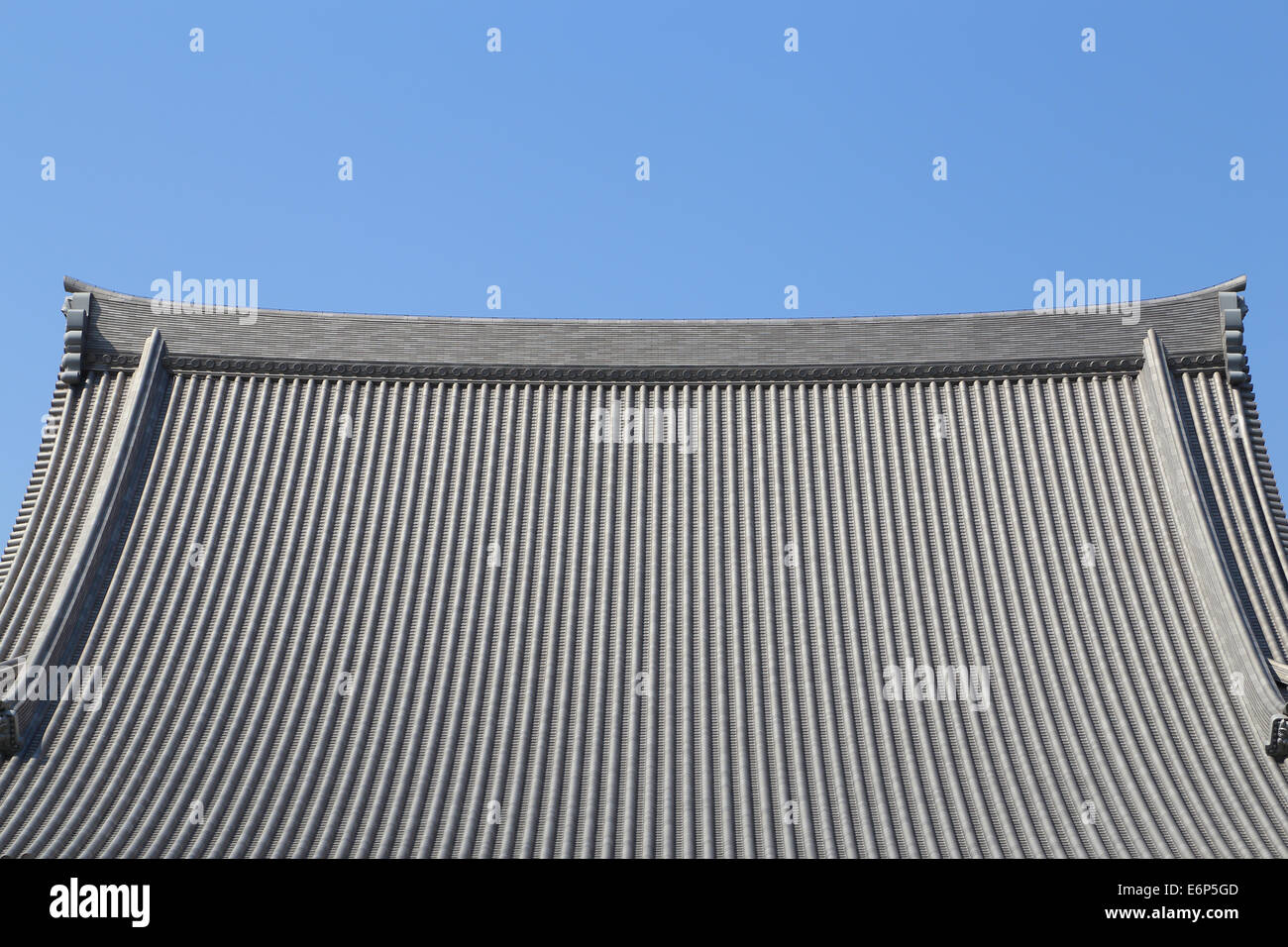 Japanese roof style with blue sky Stock Photo - Alamy
