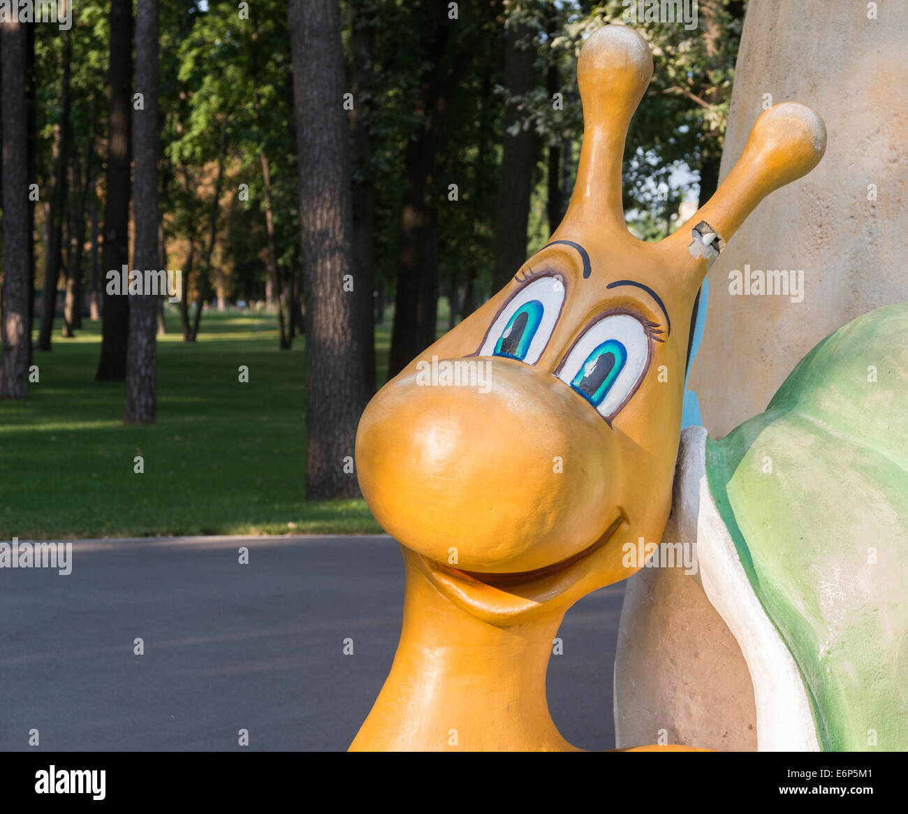 nice coloured snail smiling in a park Stock Photo - Alamy