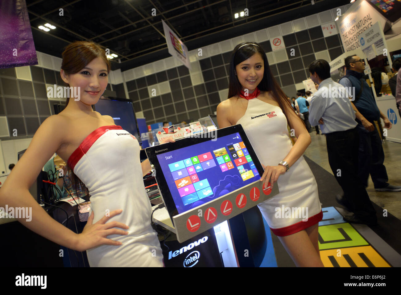 Singapore. 28th Aug, 2014. Models show a product during the COMEX Show ...