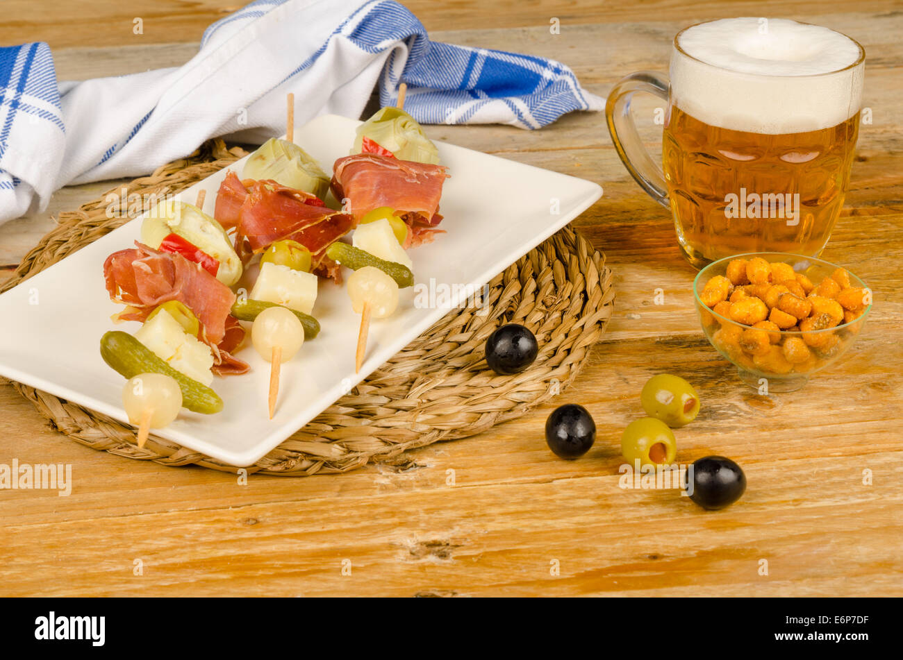 Serrano ham tapa on a skewer, Spanish appetizer Stock Photo - Alamy