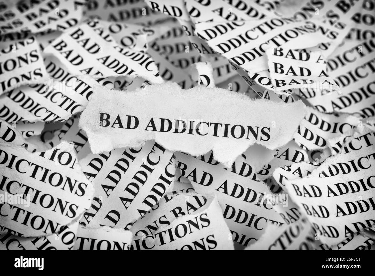Torn Pieces Of Paper With The Words Bad Addictions Concept Image Torn Pieces Of Paper With The Words Bad Addictions Concept Image