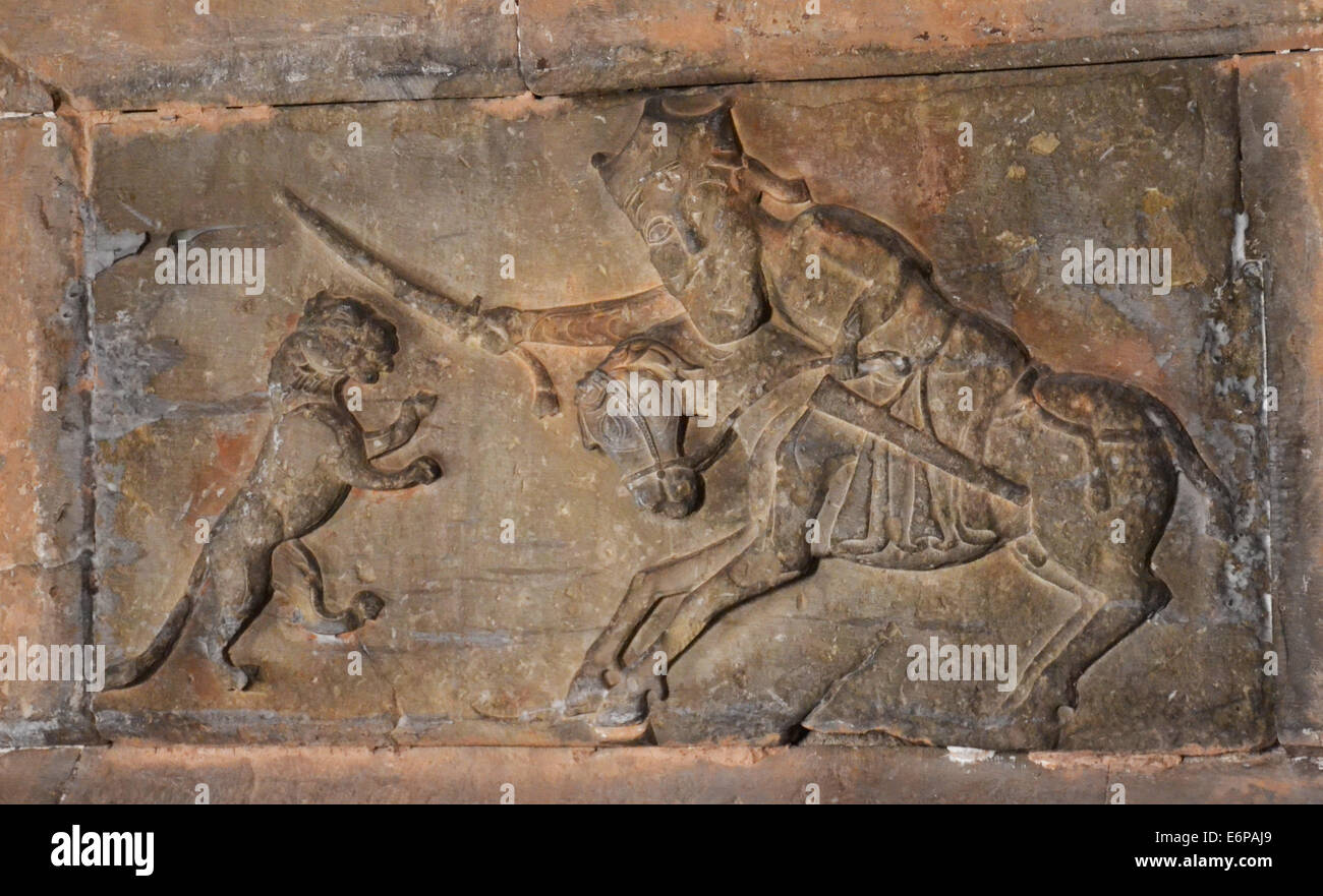 Ancient carvings on a stone Stock Photo - Alamy