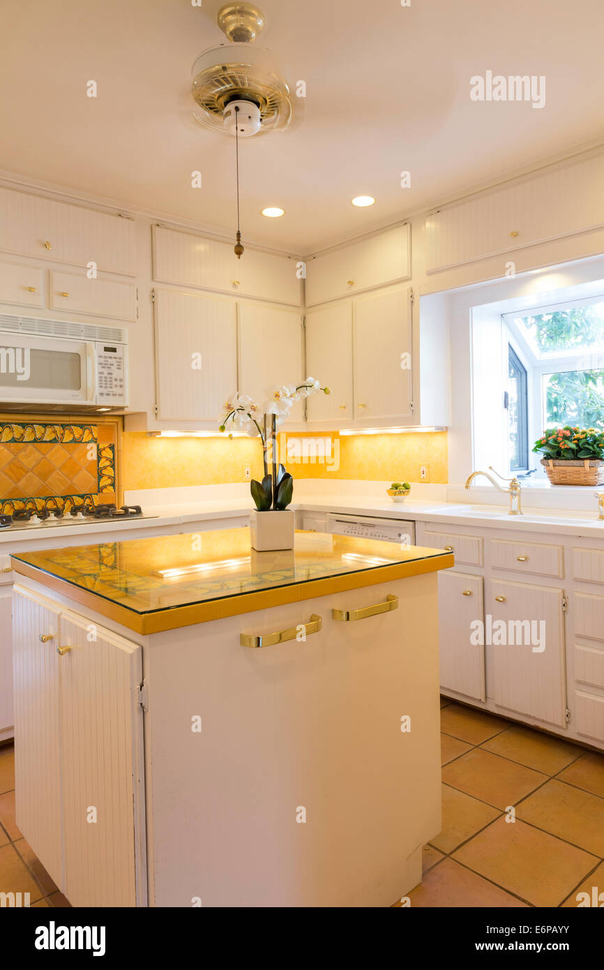 White Kitchen with Yellow Tile Accents, USA Stock Photo - Alamy