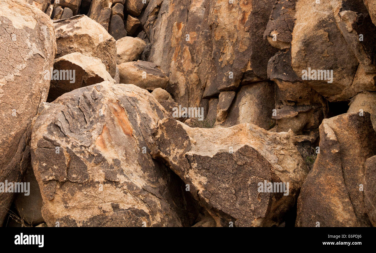 Brown granite rocks piled in desert. Background texture Stock Photo - Alamy