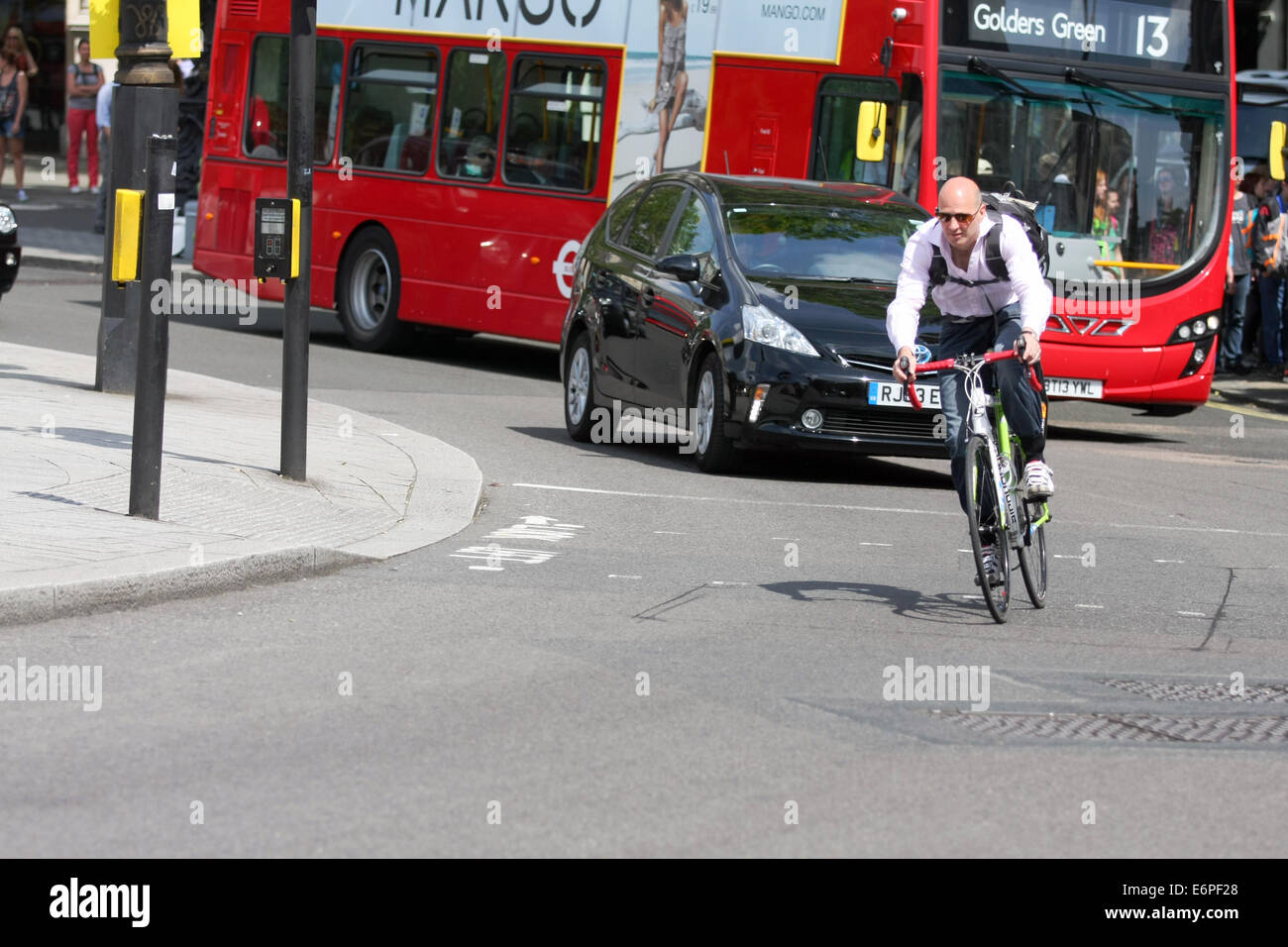 Traffic traveling around a roundabout in London Stock Photo - Alamy