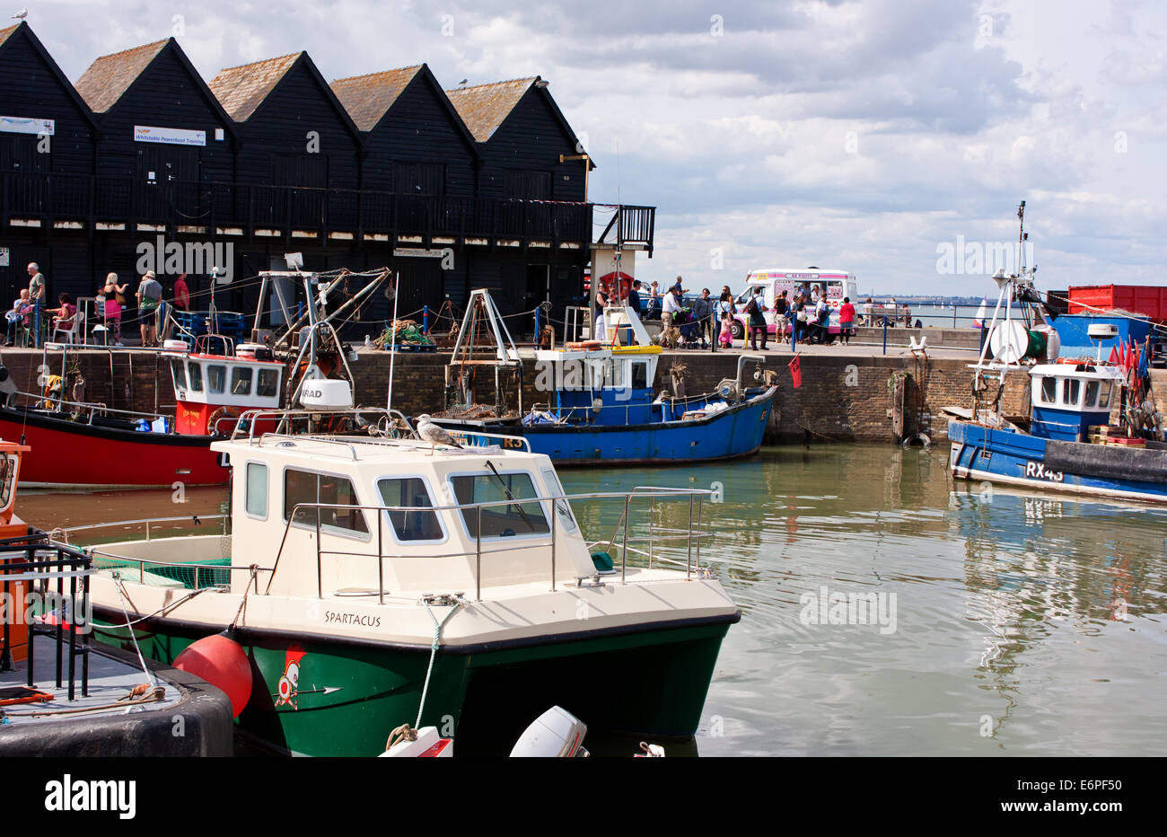 The busy fishing harbour of Whitstable Stock Photo - Alamy