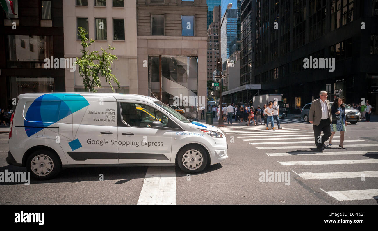 A Google Shopping Express delivery van stopped at a traffic light on ...