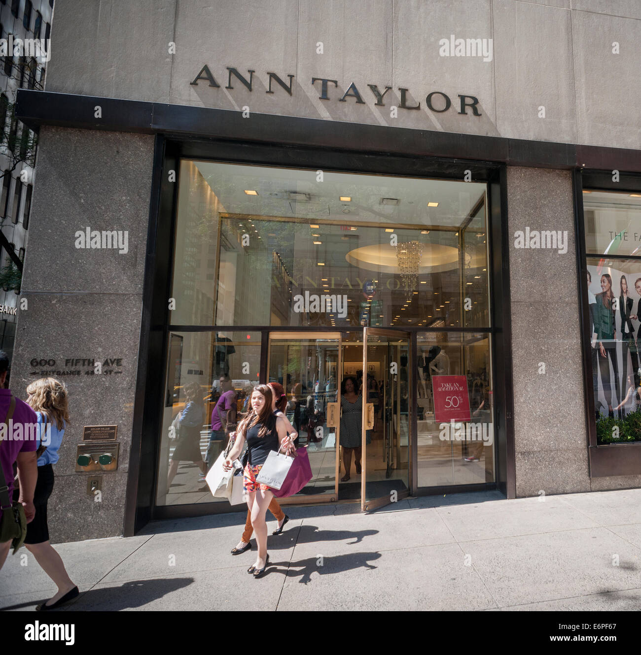 Shoppers leave an Ann Taylor store on Fifth Avenue in New York Stock ...