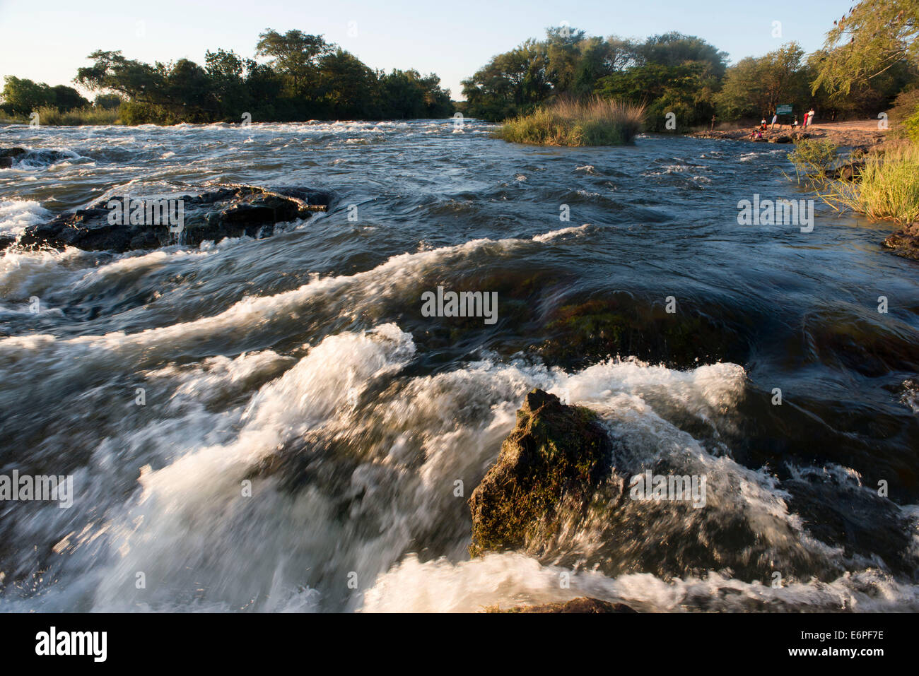 Sunset in the Victoria Falls. Victoria Falls is the result of soft ...