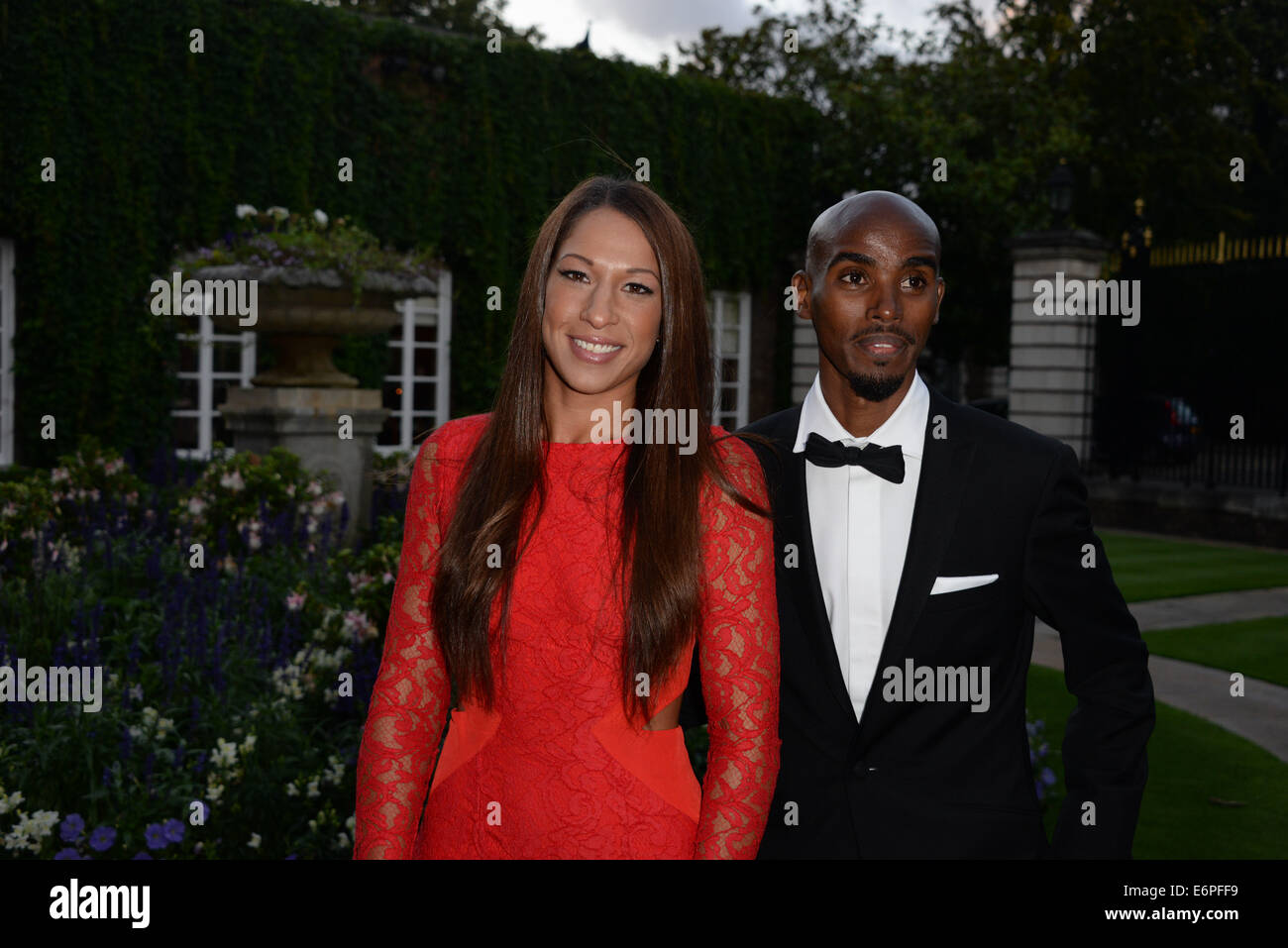 London, UK. 28th August, 2014. Mo Farah and Tania Nell attends the Mo ...