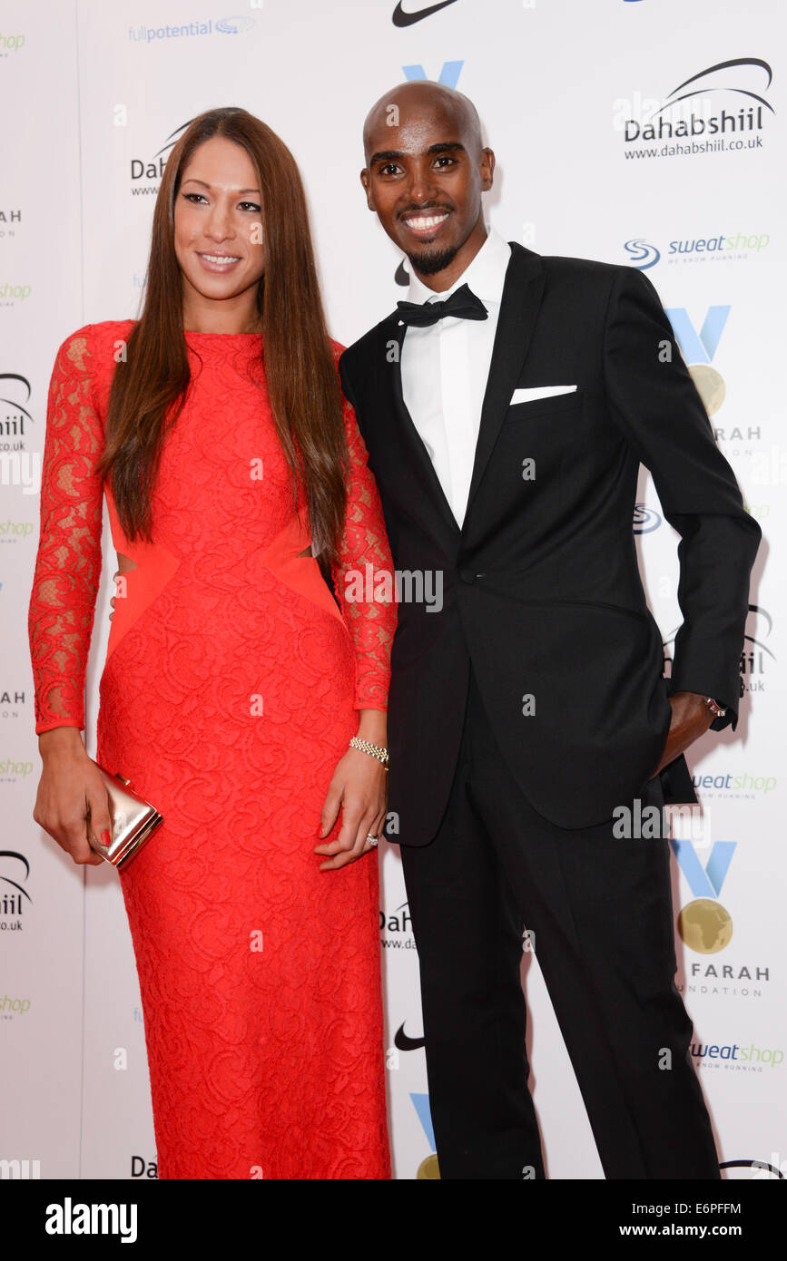 London, UK. 28th August, 2014. Mo Farah and Tania Nell attends the Mo ...