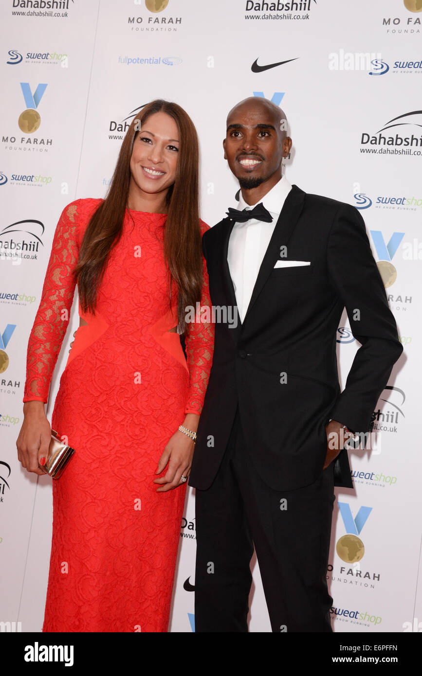 London, UK. 28th August, 2014. Mo Farah and Tania Nell attends the Mo ...