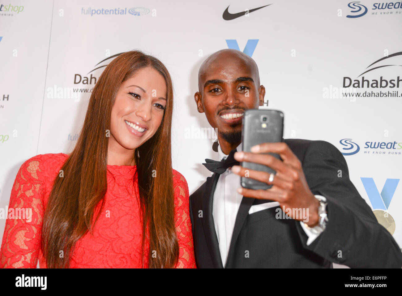 London, UK. 28th August, 2014. Mo Farah and Tania Nell attends the Mo ...