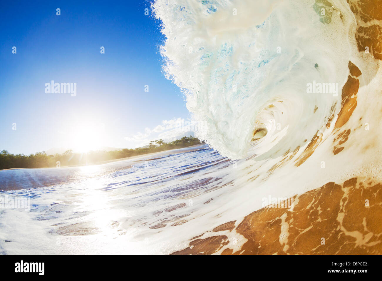 Sandy Ocean Wave Crashing onto the Beach Stock Photo - Alamy