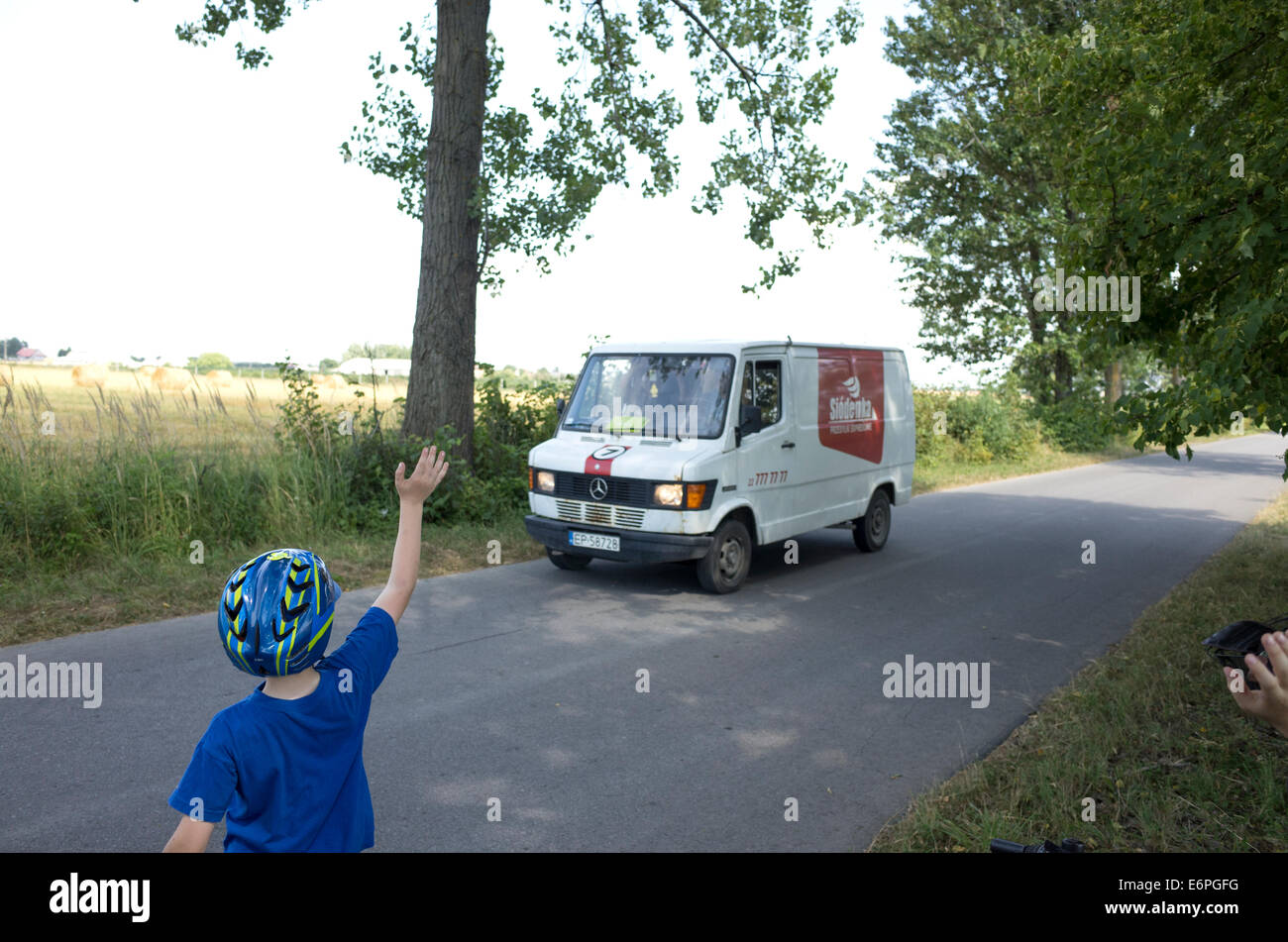 Hailing a Polish package delivery van for roadside delivery service ...