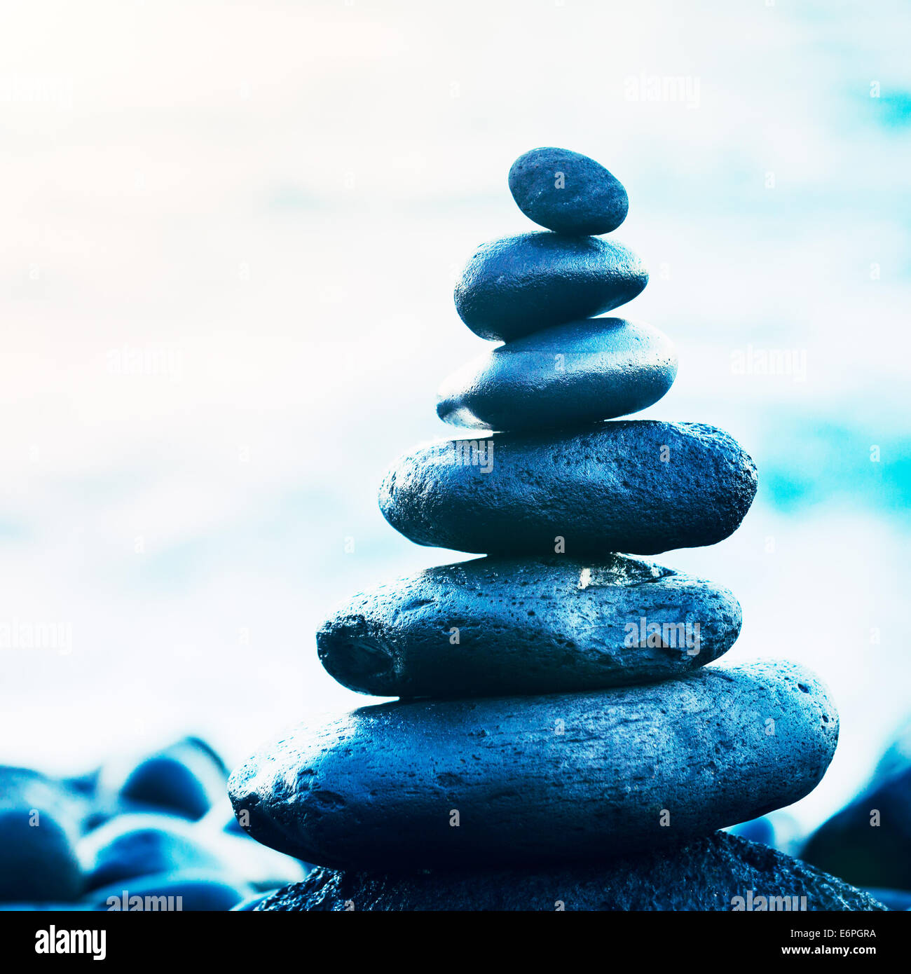 Stack of Round Smooth Stones on the Seashore Stock Photo - Alamy