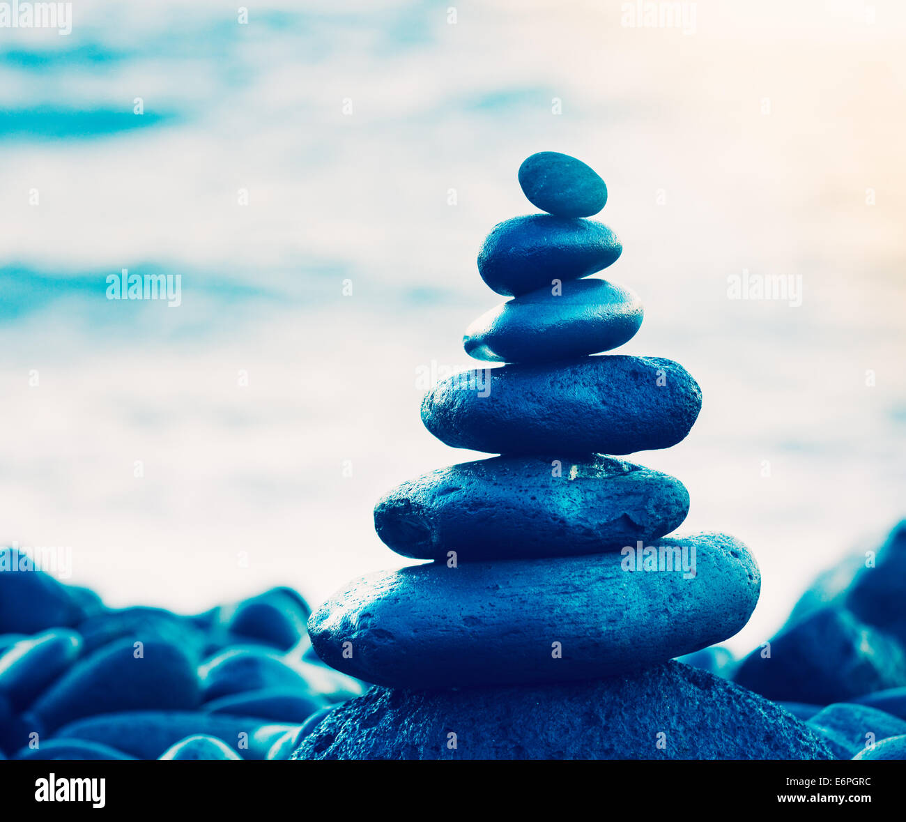 Stack of Round Smooth Stones on the Seashore Stock Photo - Alamy