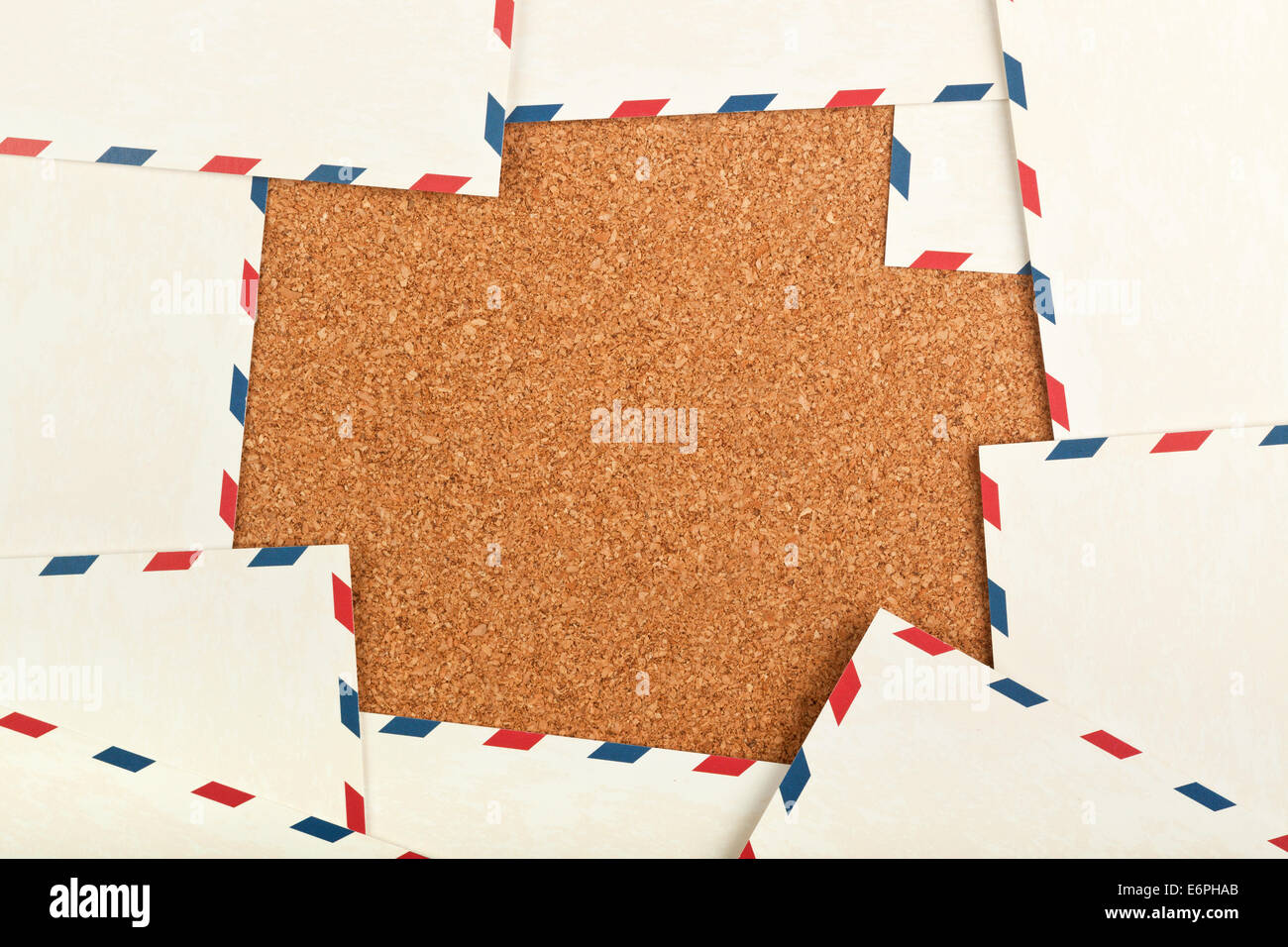 Post cards framing a corkboard Stock Photo - Alamy