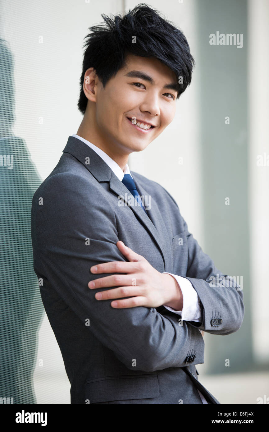Portrait of young businessman Stock Photo - Alamy
