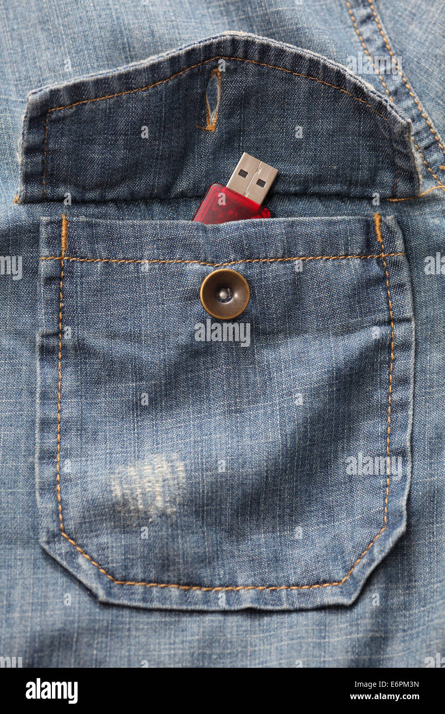 USB flash drive in the denim shirt pocket Stock Photo - Alamy
