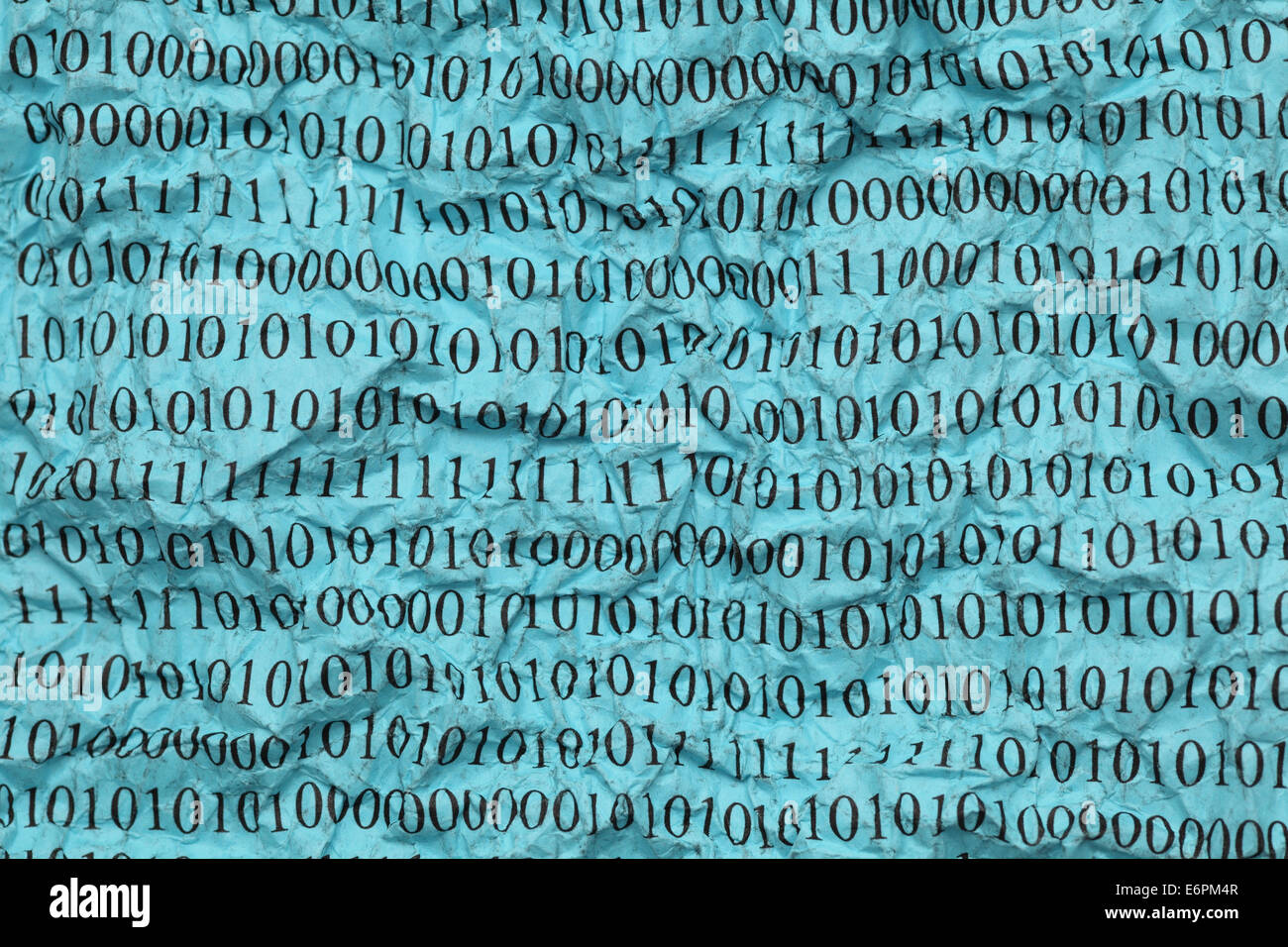 Crushed blue paper with binary code. Close-up Stock Photo - Alamy