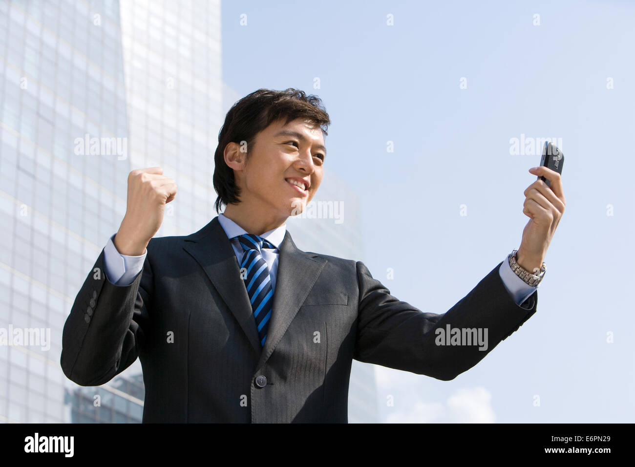 Hand Raised Standing Cheering Building Exterior Hi Res Stock