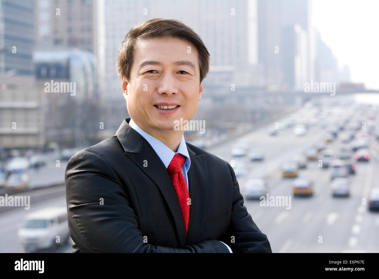 Mature businessman standing over hi-res stock photography and images ...