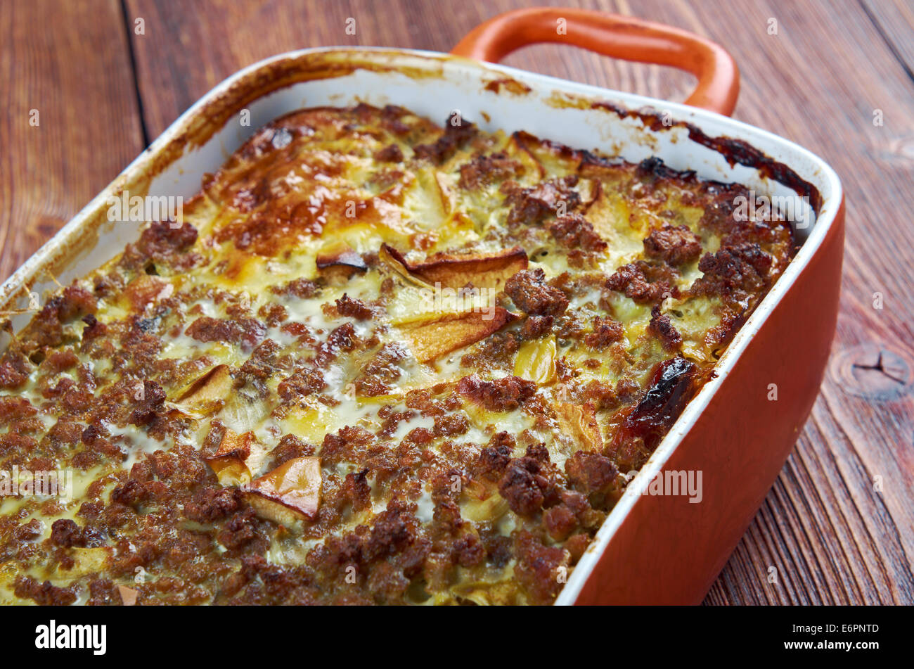 Bobotie also spelt bobotjie, is a South African dish consisting of ...