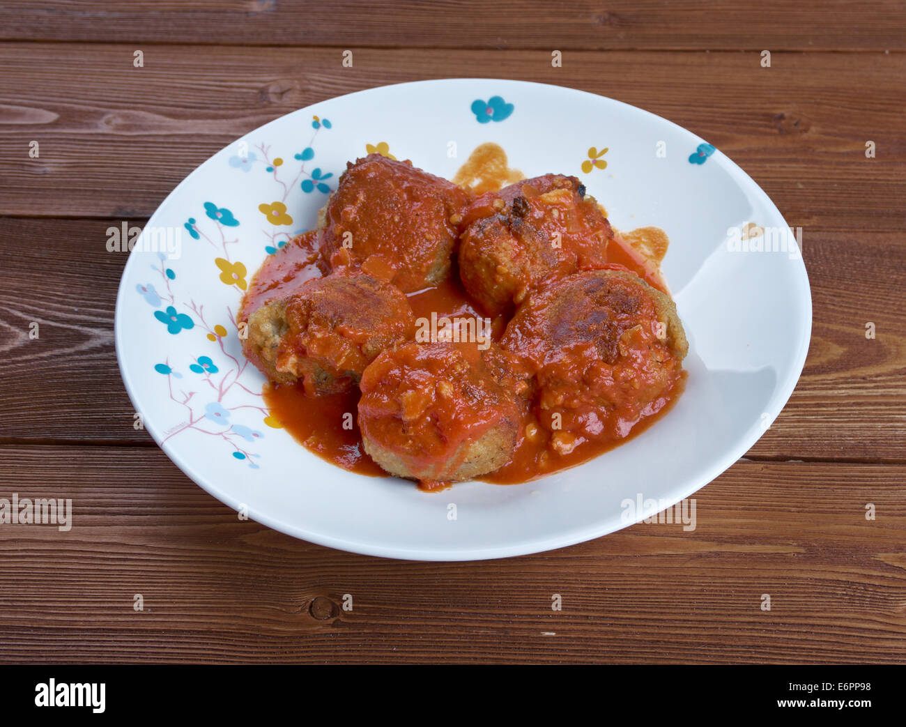 Boulettes de poisson Moroccan cuisine - fishballs in tomato sauce Stock ...