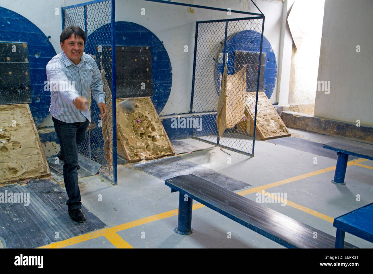 Man playing tejo, the national sport of Colombia Stock Photo - Alamy