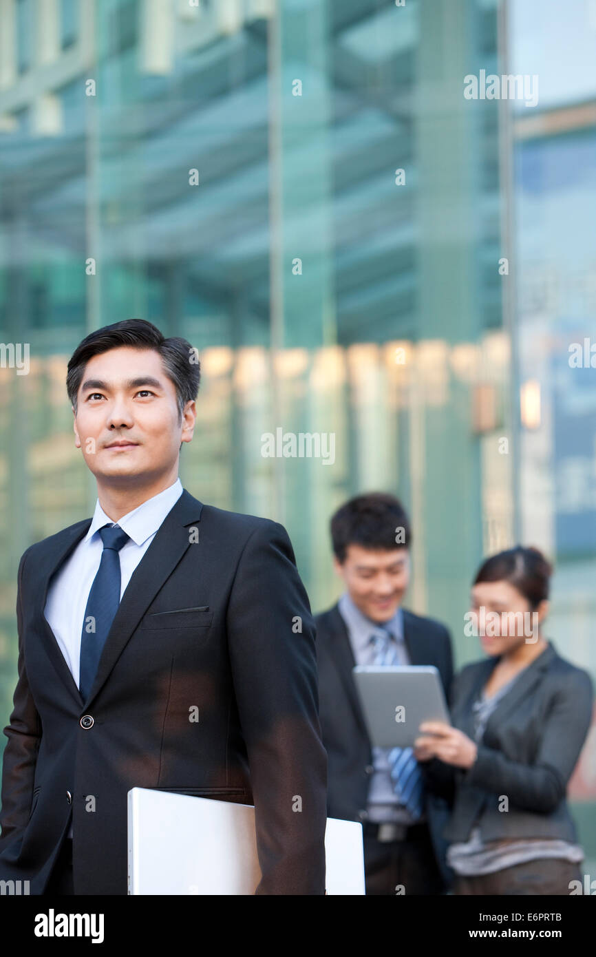 Business people outside office building Stock Photo - Alamy