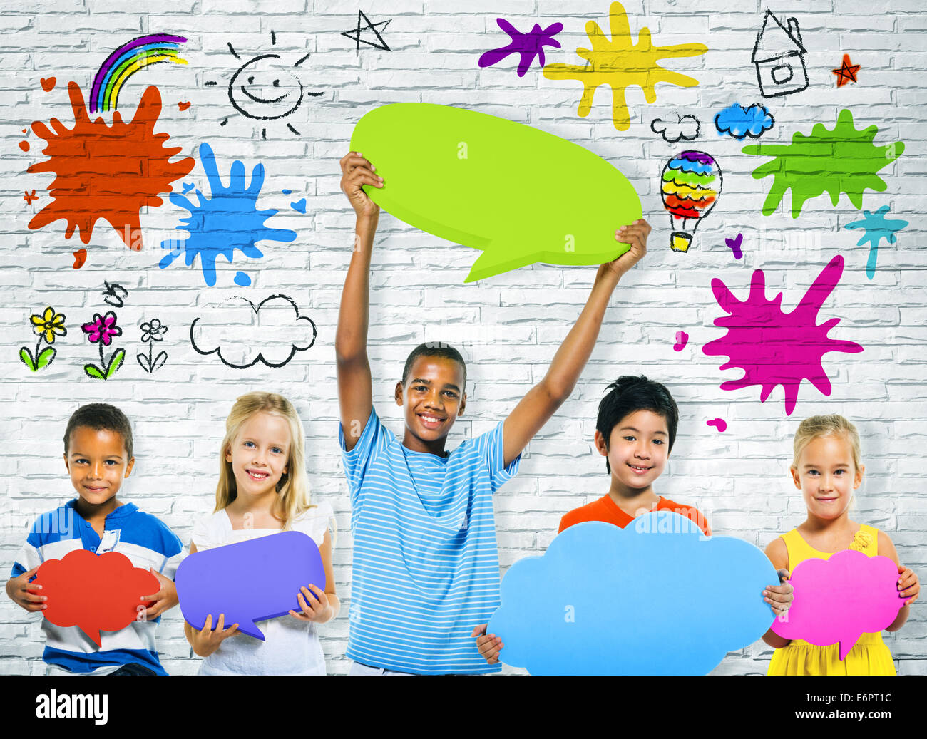 Cheerful children with multi colored speech bubbles Stock Photo - Alamy