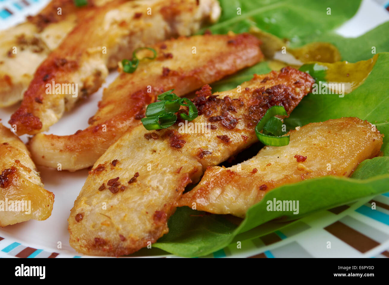 Pollo di Modena - fried chicken fillet.Italian cuisine containing ...