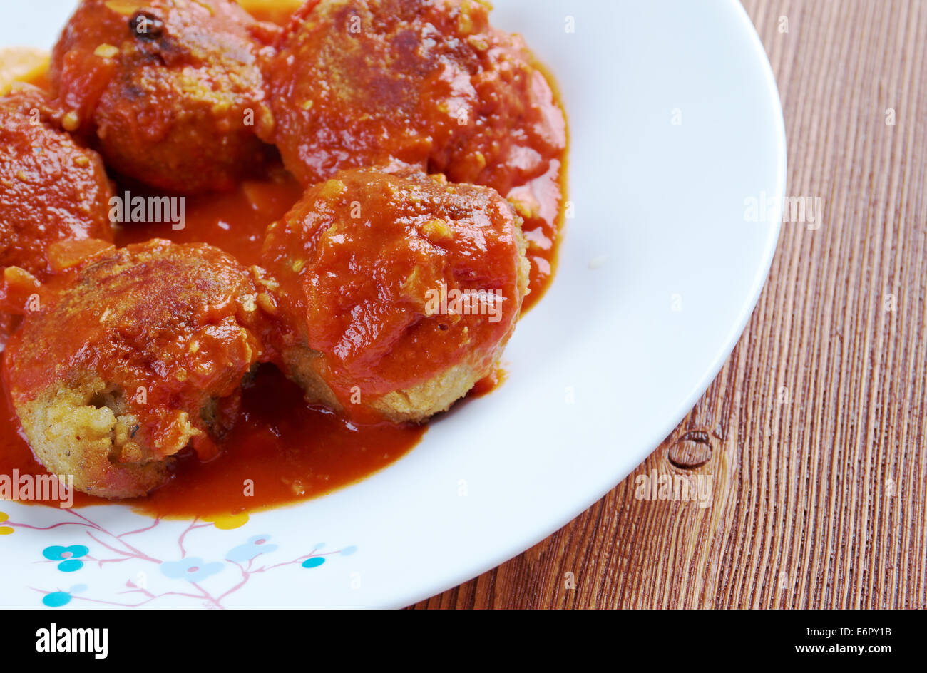 Boulettes de poisson Moroccan cuisine - fishballs in tomato sauce Stock ...