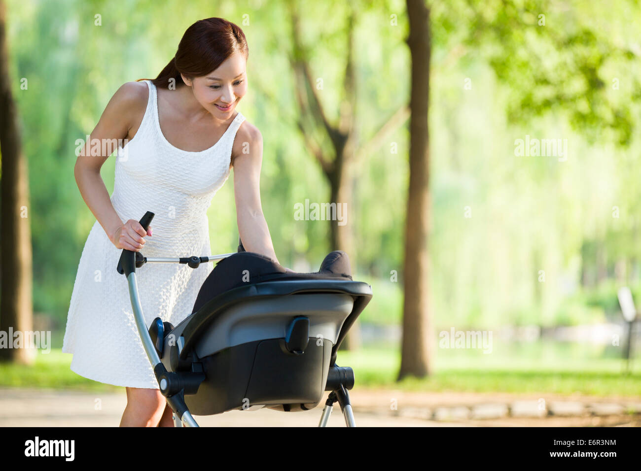 Strolling a baby pram hi-res stock photography and images - Alamy
