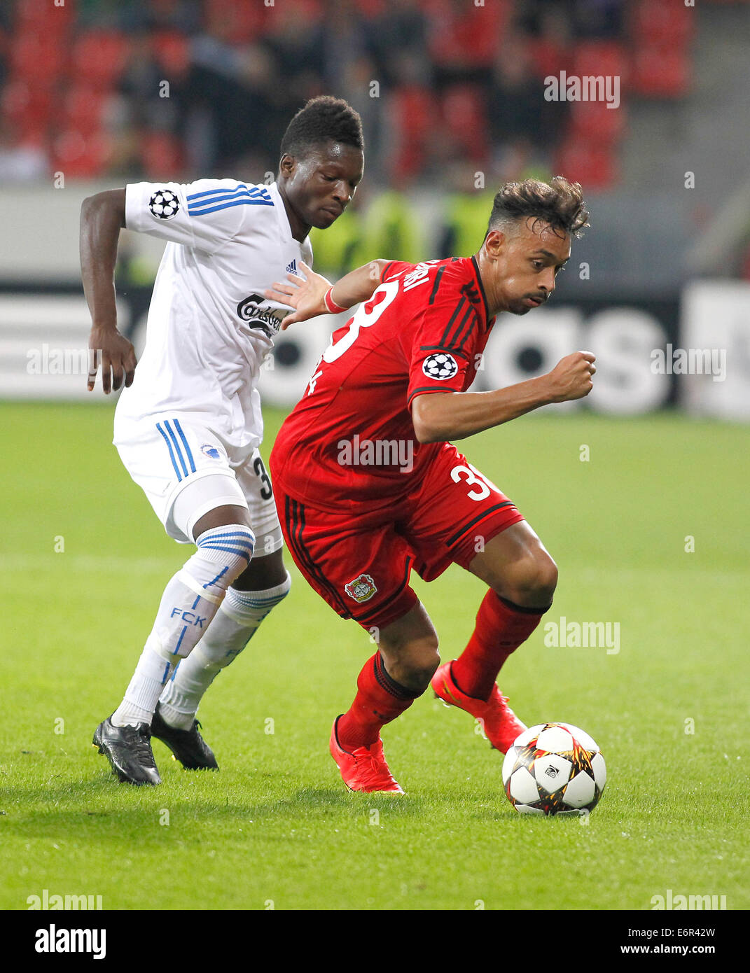 Leverkusen's Karim Bellarabi (R) against Copenhagens Danny Amankwaa ...