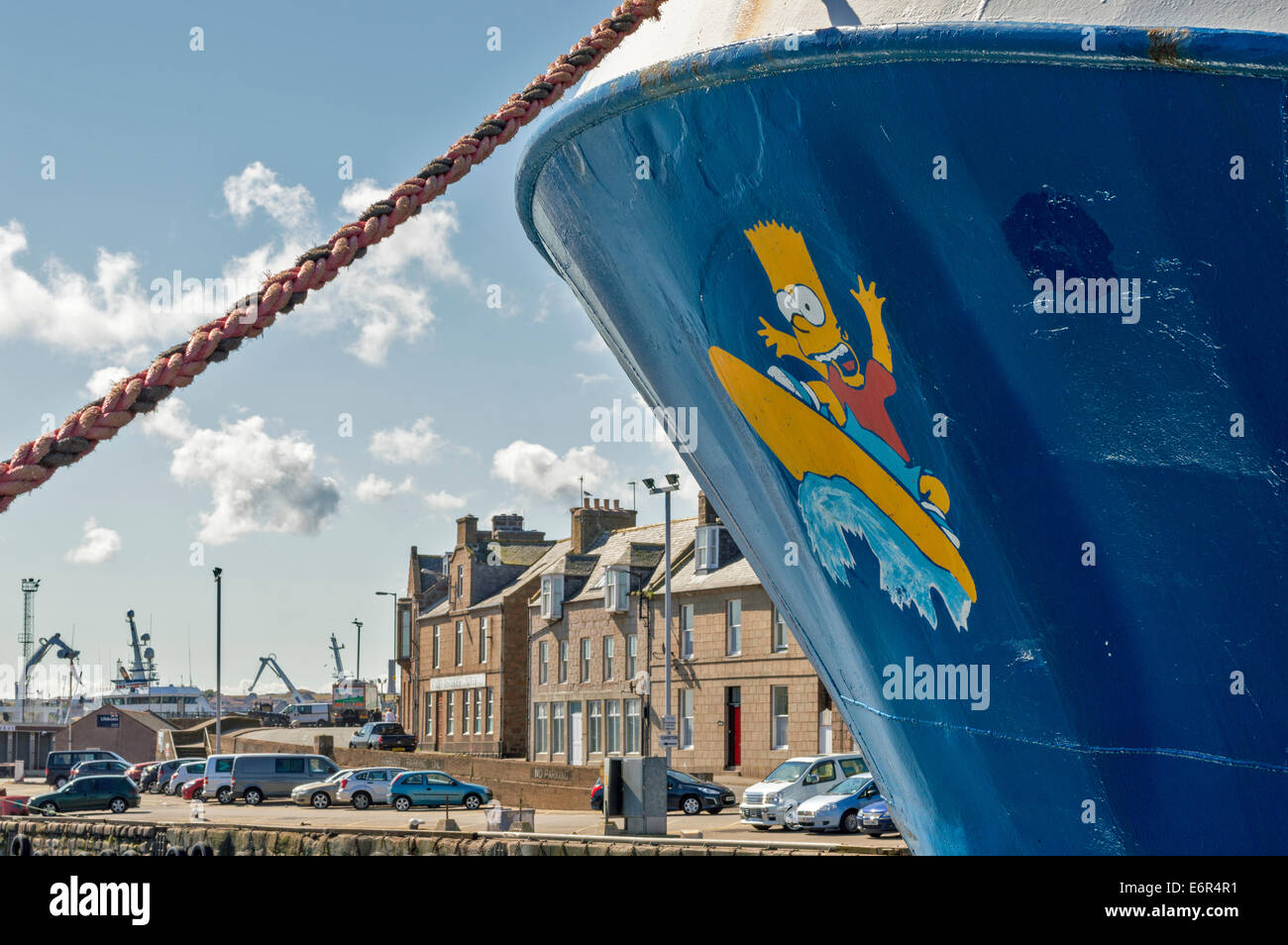PETERHEAD HARBOUR ABERDEENSHIRE BART SIMPSON AND SURFBOARD ON THE PROW ...