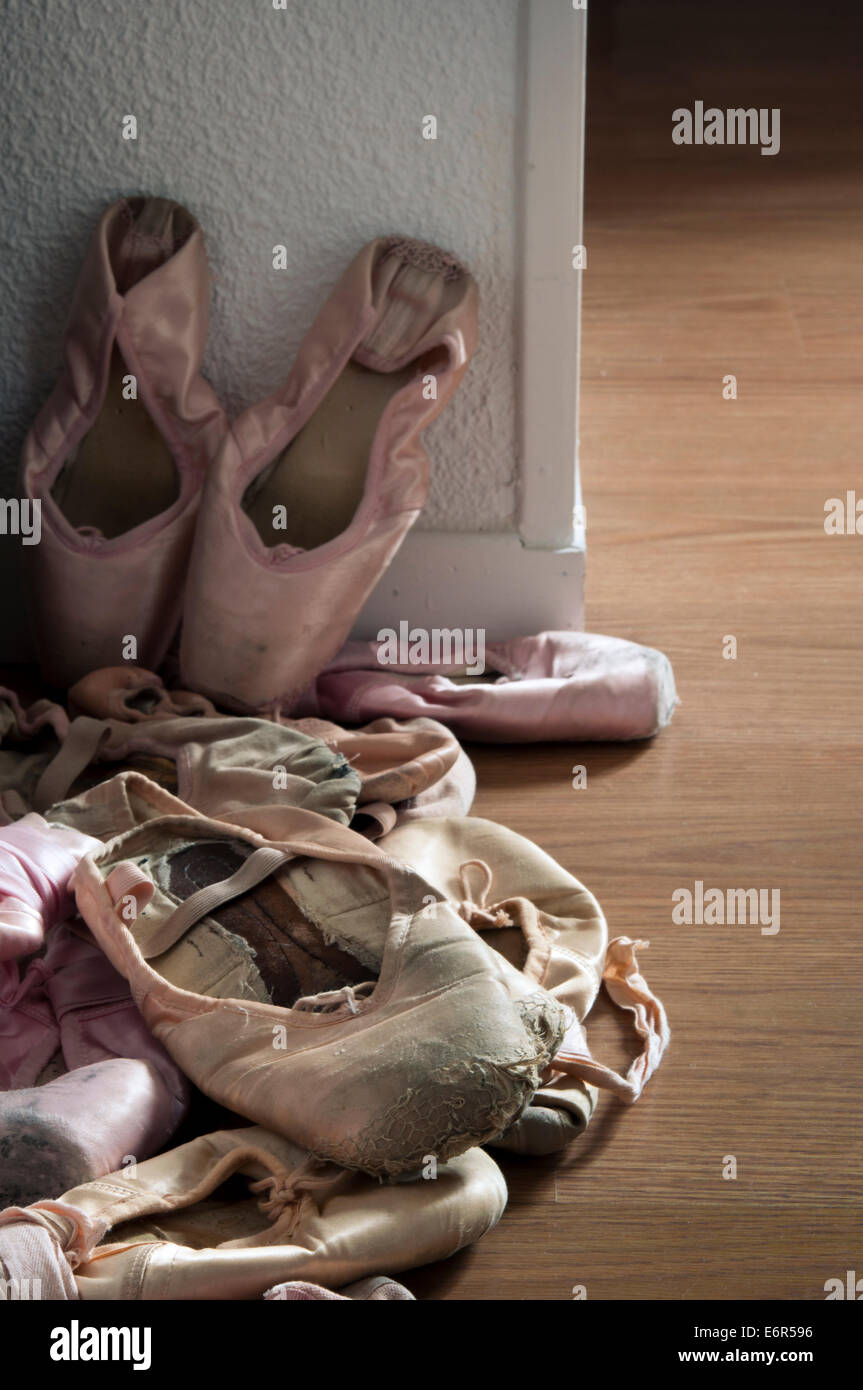 Group of pointe shoes on wooden floor Stock Photo - Alamy