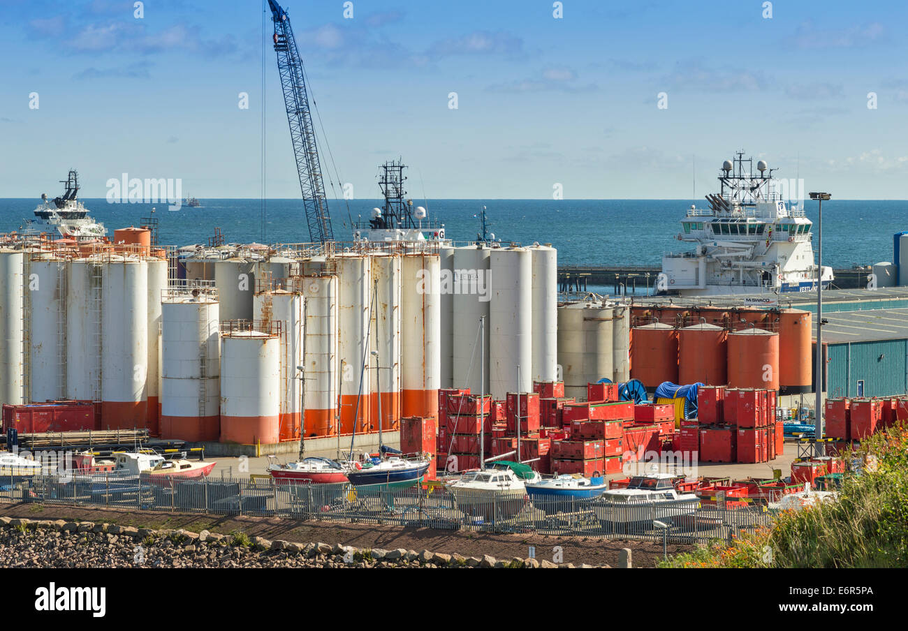 PETERHEAD HARBOUR ABERDEENSHIRE SCOTLAND WITH STORAGE TANKS RED ...