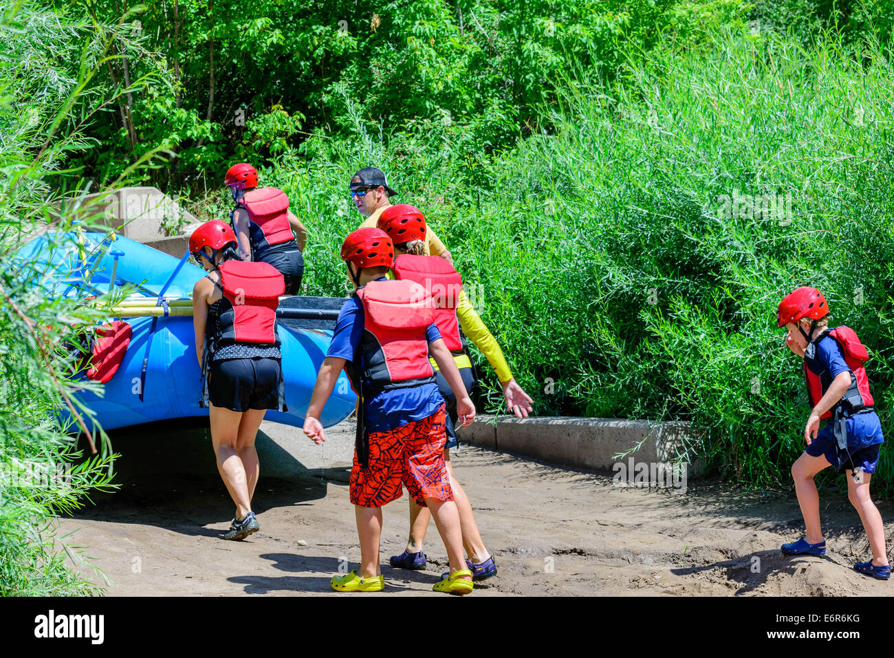 rafters carrying their inflatable raft Stock Photo - Alamy