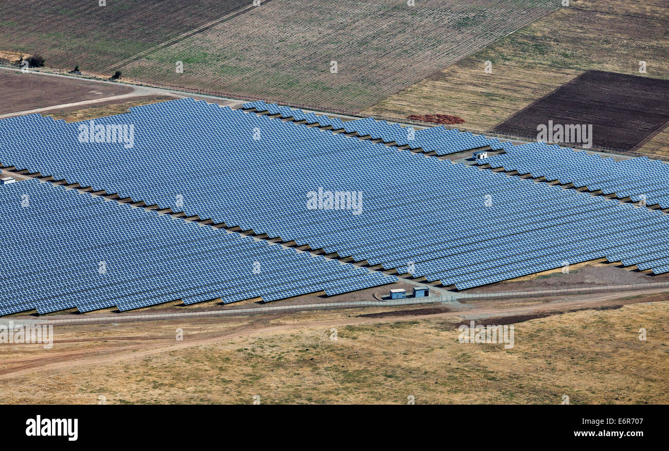Aerial photo of solar power plant. Many solar energy panels in ...