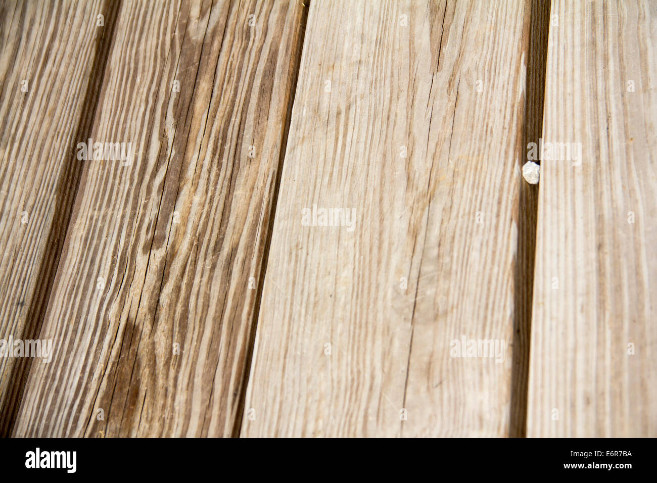 Wood Grain Background with Pebble Wedged in Between Stock Photo - Alamy