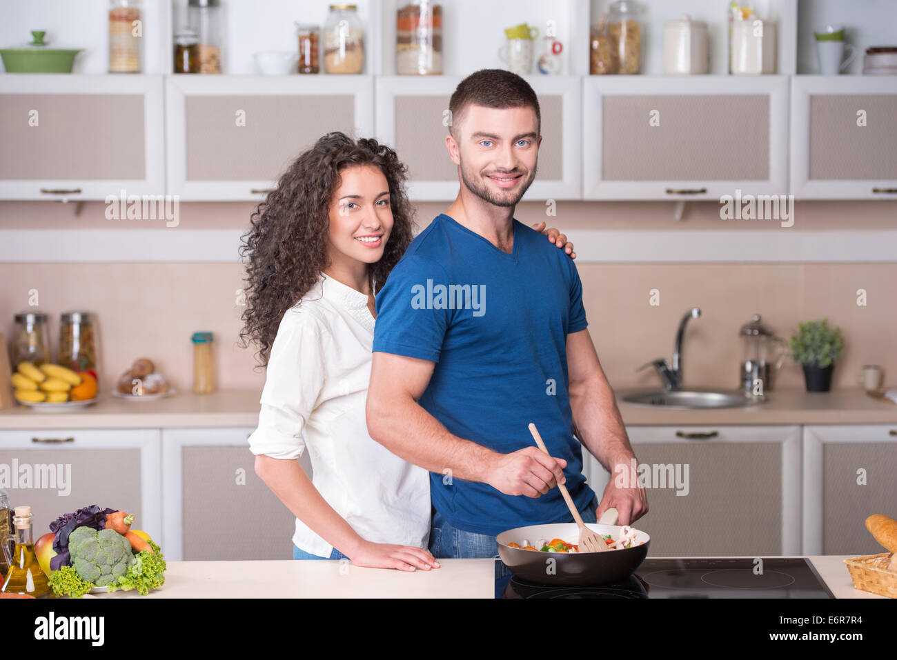 Preparing supper hi-res stock photography and images - Alamy