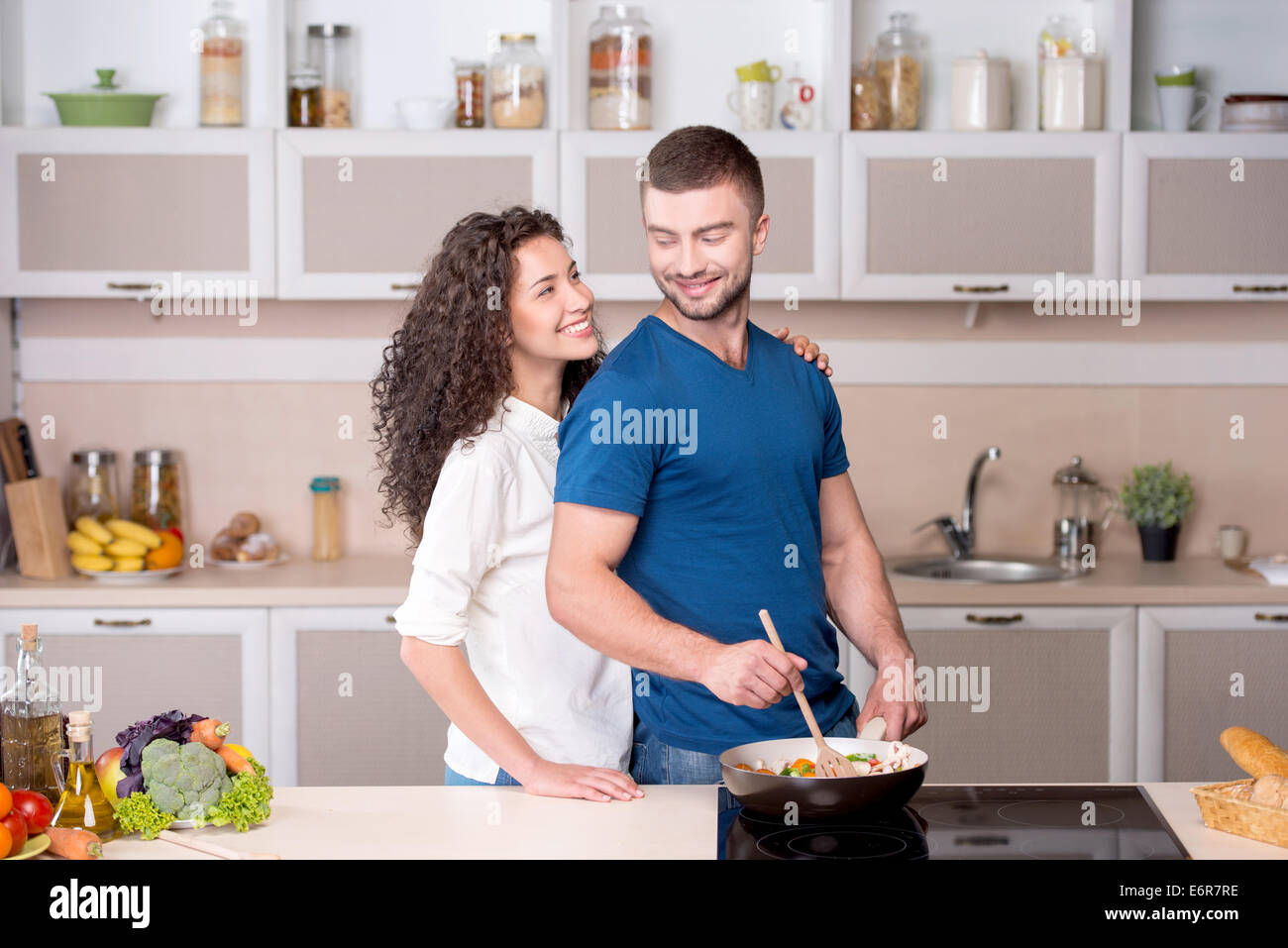 Preparing supper hi-res stock photography and images - Alamy
