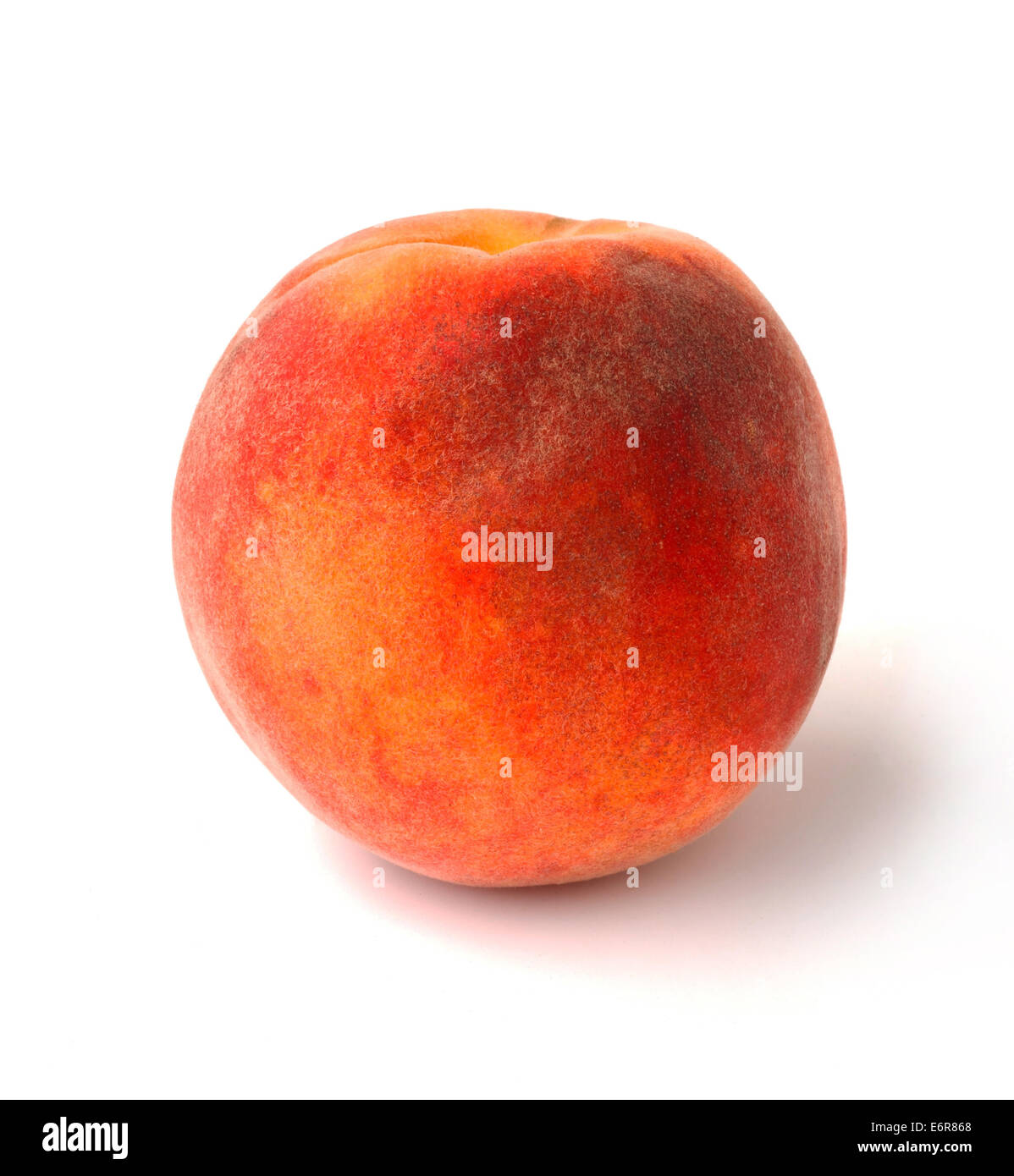 Single peach on a white background Stock Photo - Alamy