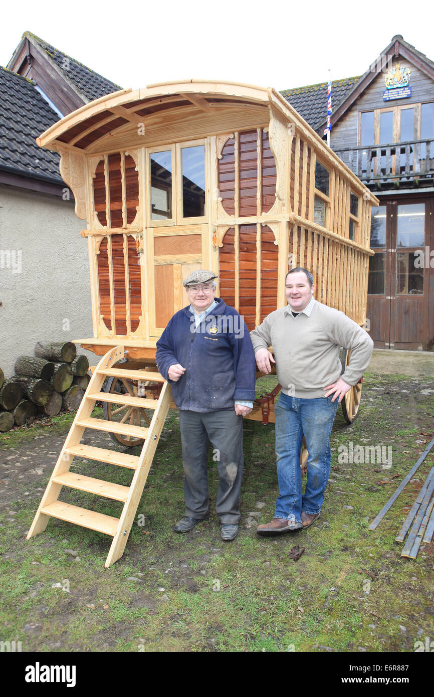 Traditional wheelwright Greg Rowlands with father Mike working on a new ...