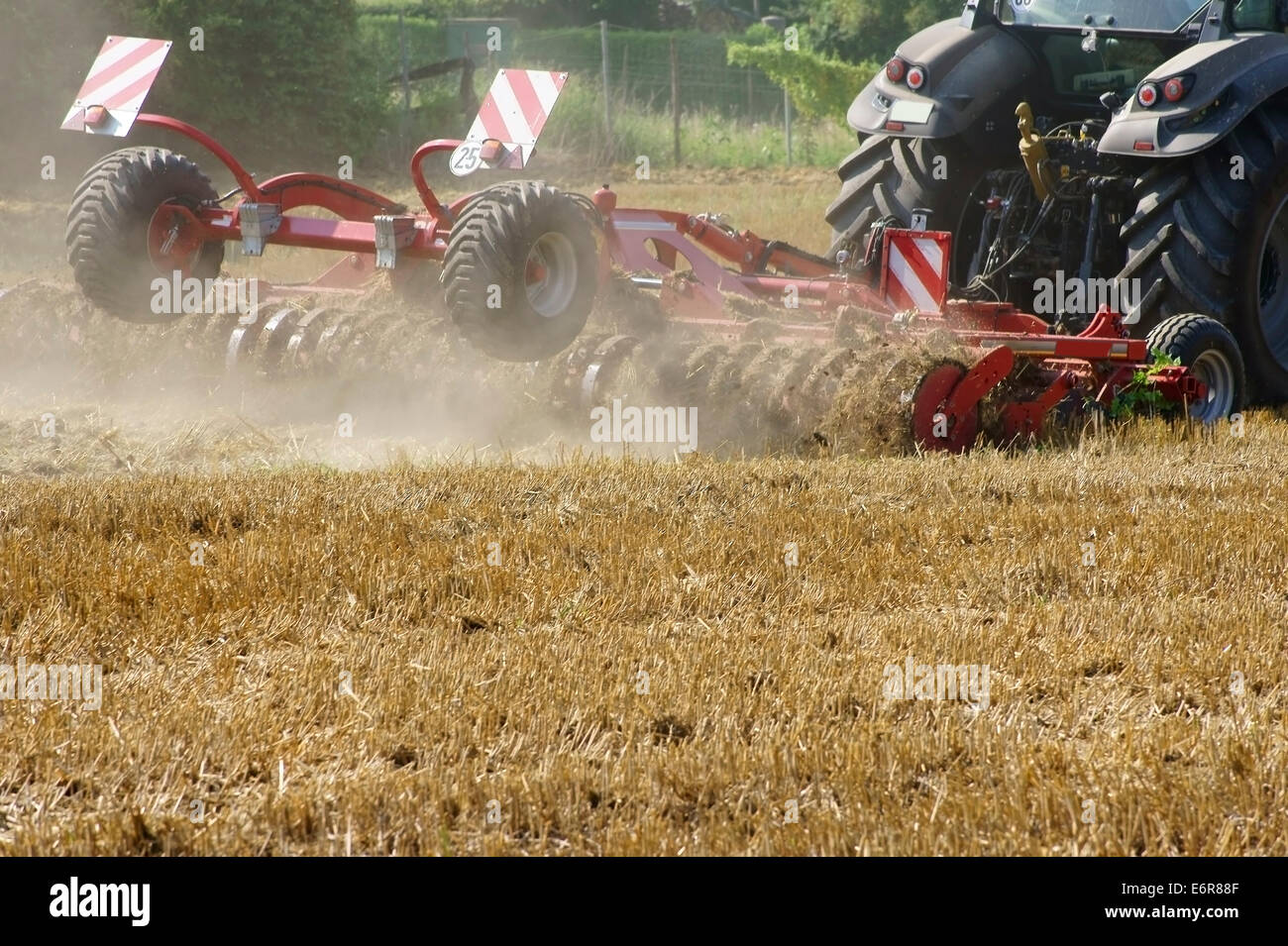 Tractor with plow Stock Photo - Alamy
