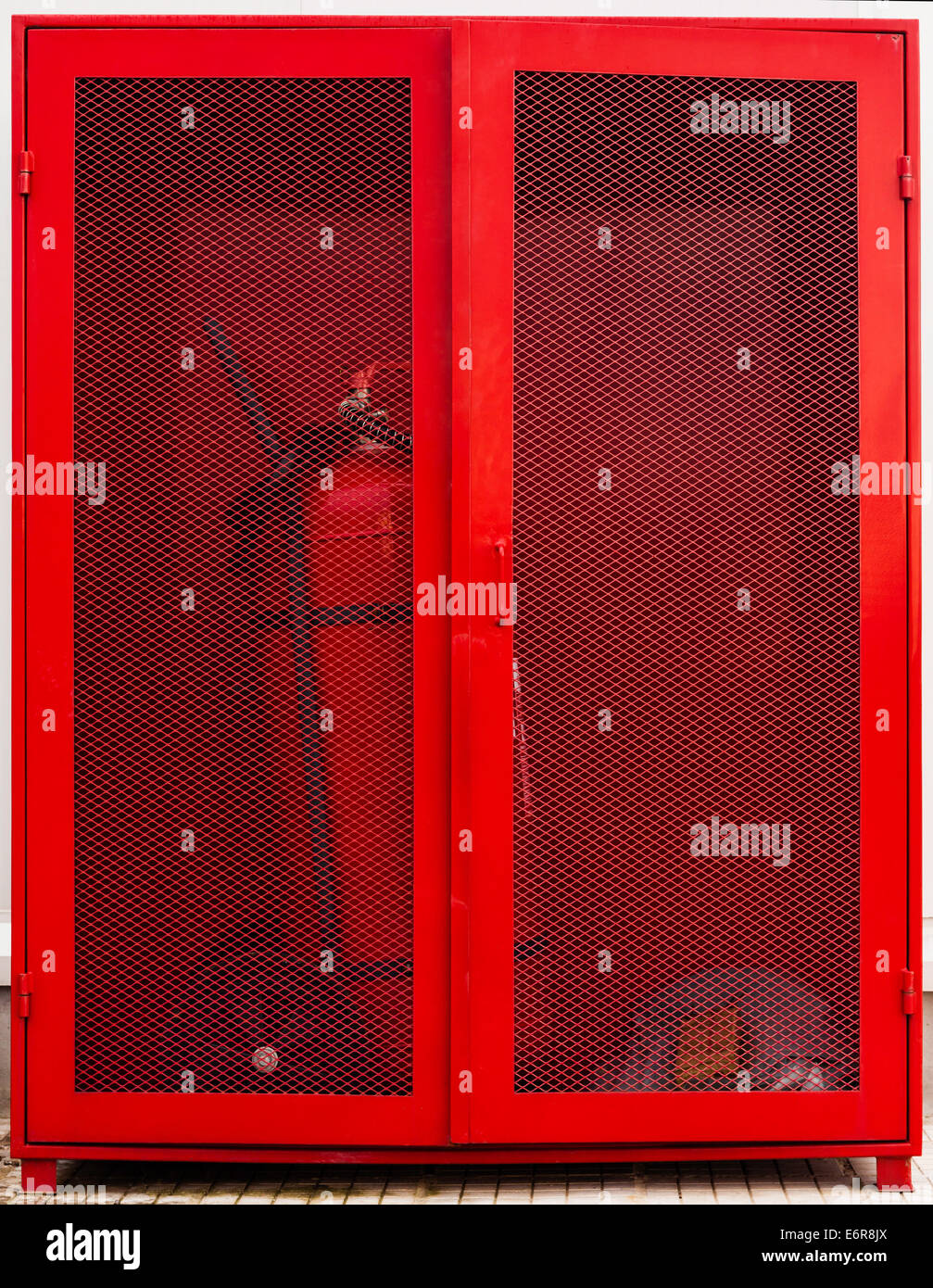 Fire fighter equipment in the red box with extinguisher Stock Photo - Alamy