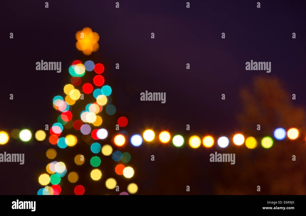 Christmas tree with unfocused bauble in the night Stock Photo - Alamy